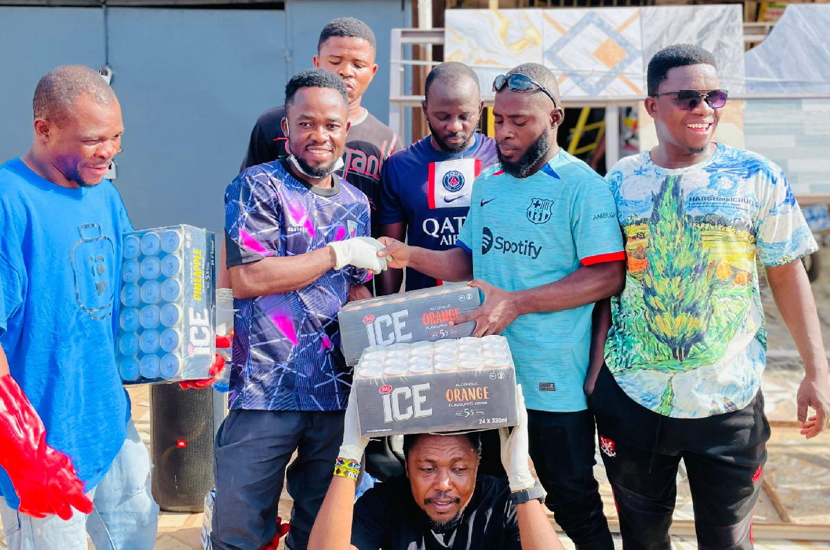 Bel Ice Rep Donates Drinks to The Street Janitors in Bolga