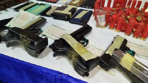 Watch police uncover cache of AK-47s, pistols, and pump-action guns ...