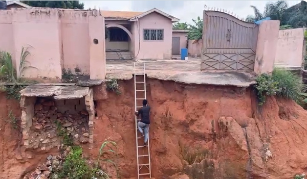 Bortianor house where residents climb two wooden ladders to get in and ...